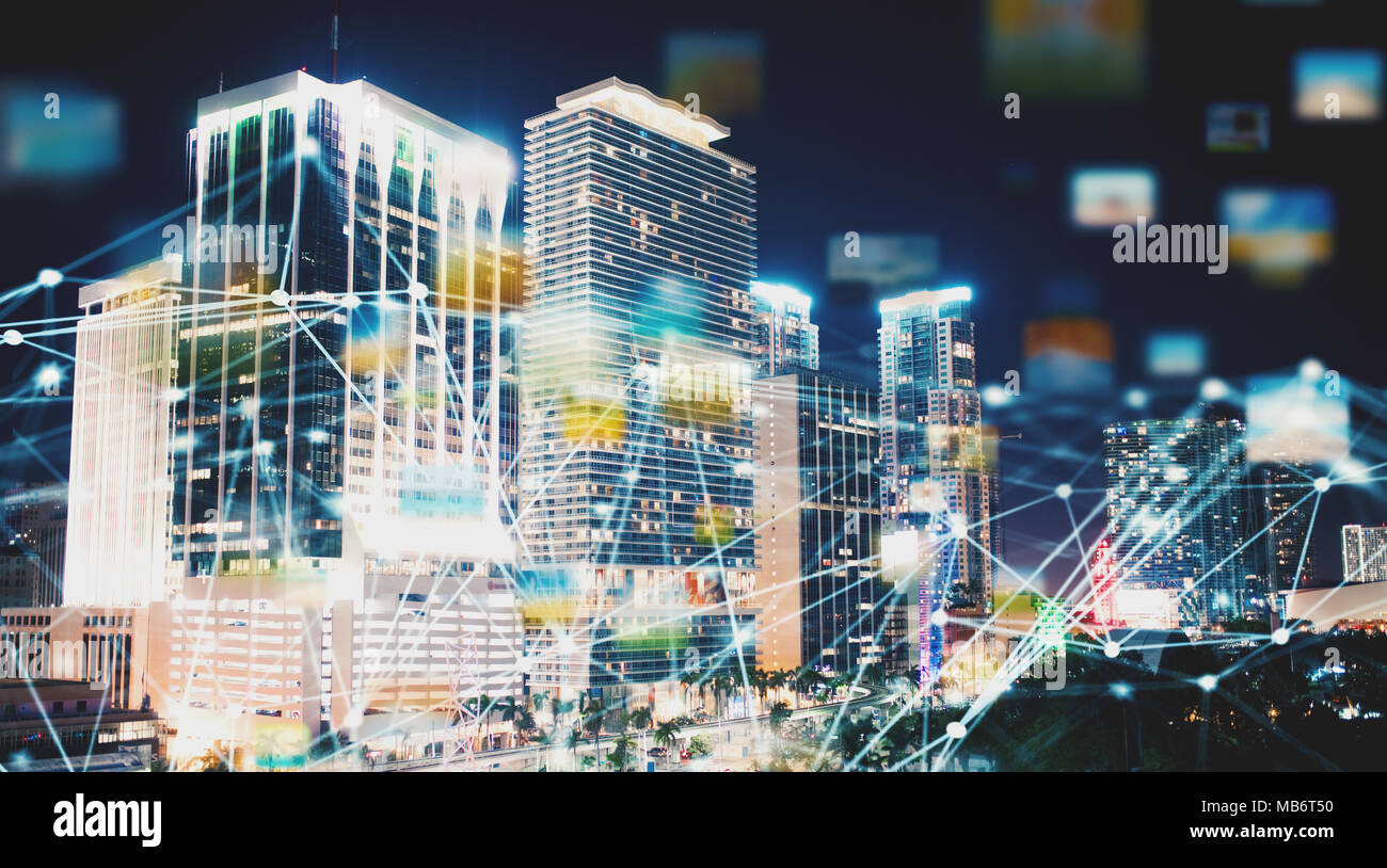 Abstract internet connection network with night city with skyscrapers ...
