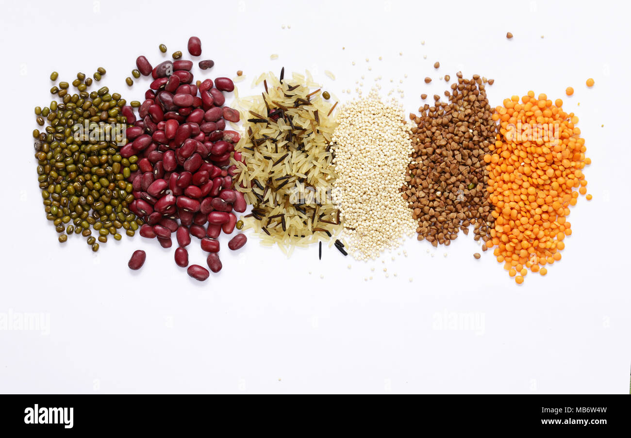 different cereals - beans, lentils, rice on a white background Stock ...