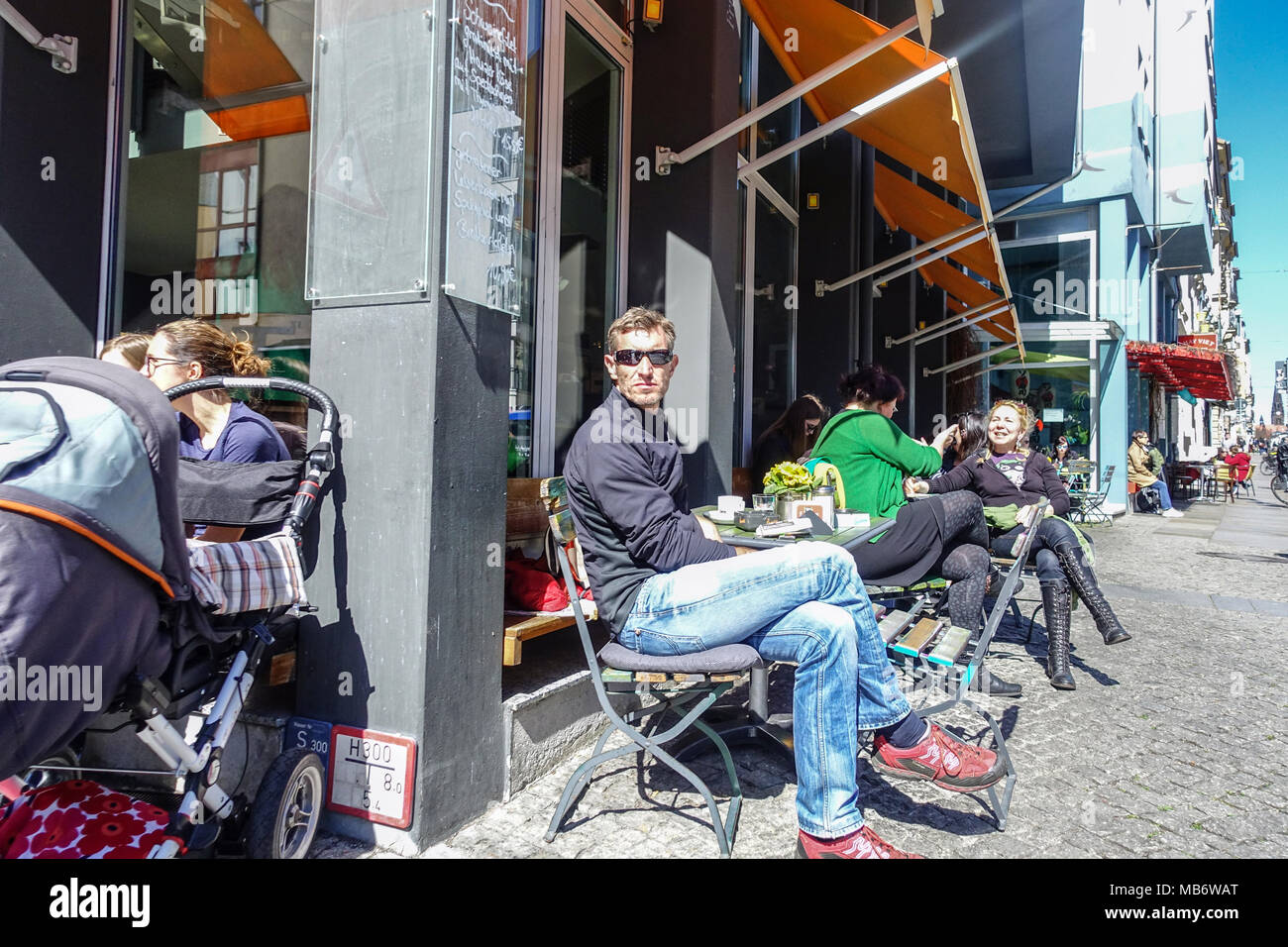 People in Dresden bar on Alaunstrasse street, Dresden Neustadt Germany ...