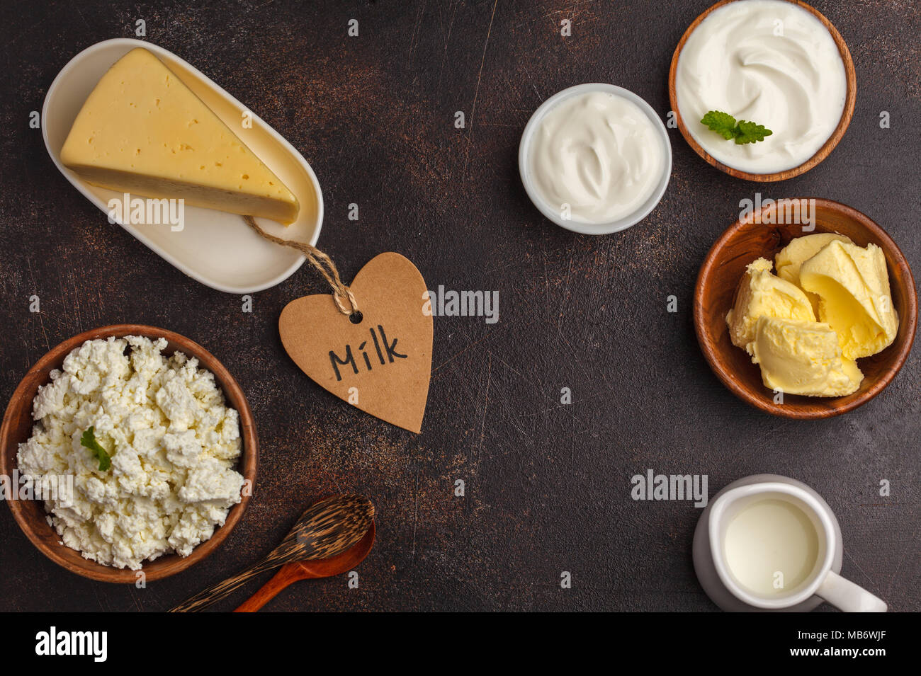 Different types of dairy products on dark background Stock Photo - Alamy