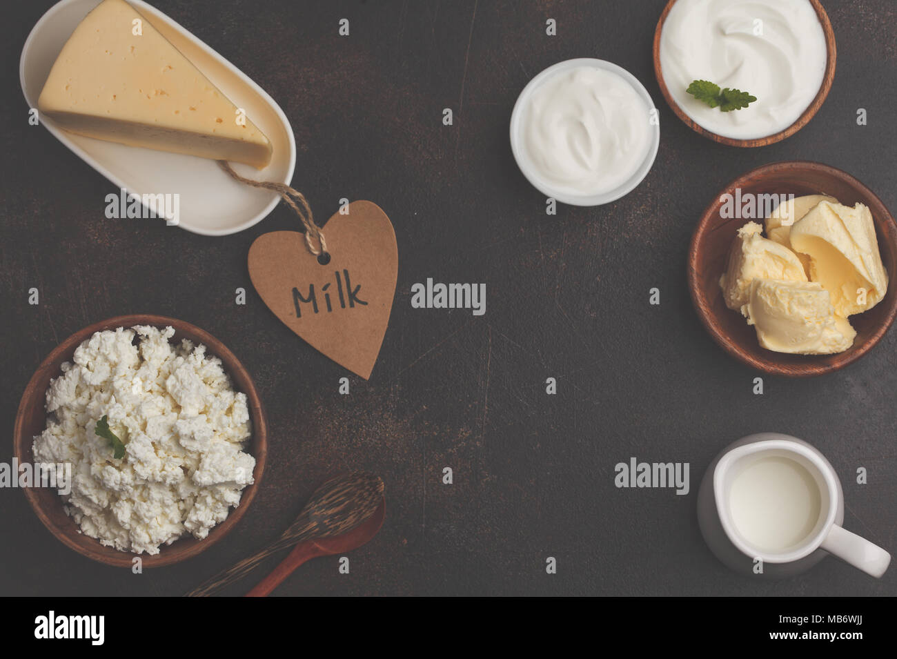 Different types of dairy products on dark background Stock Photo - Alamy