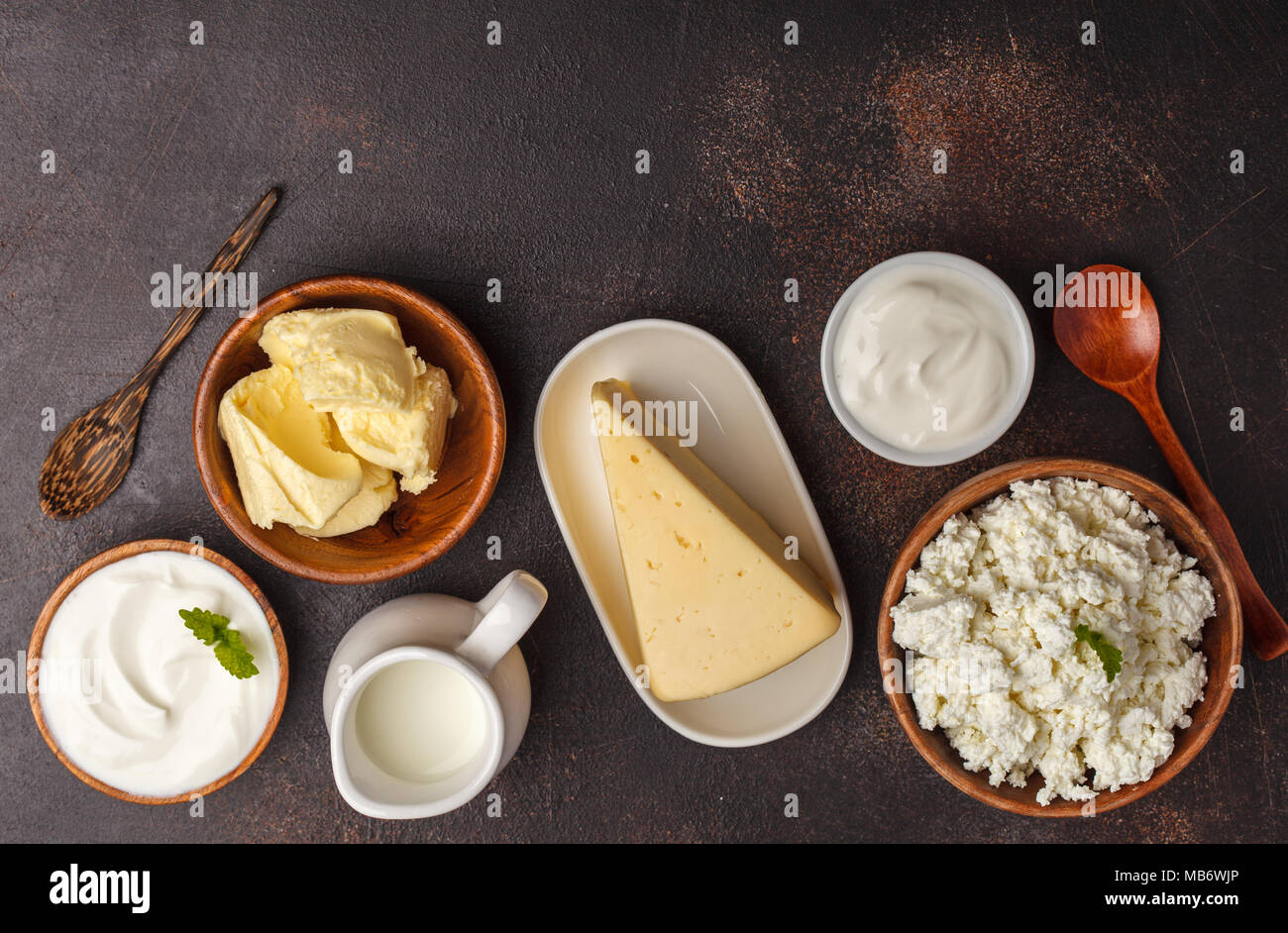 Different types of dairy products on dark background Stock Photo - Alamy