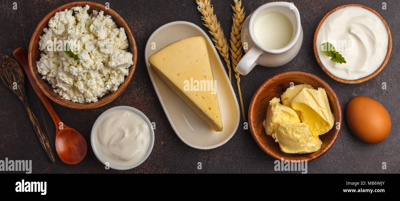 Different types of dairy products on dark background Stock Photo - Alamy