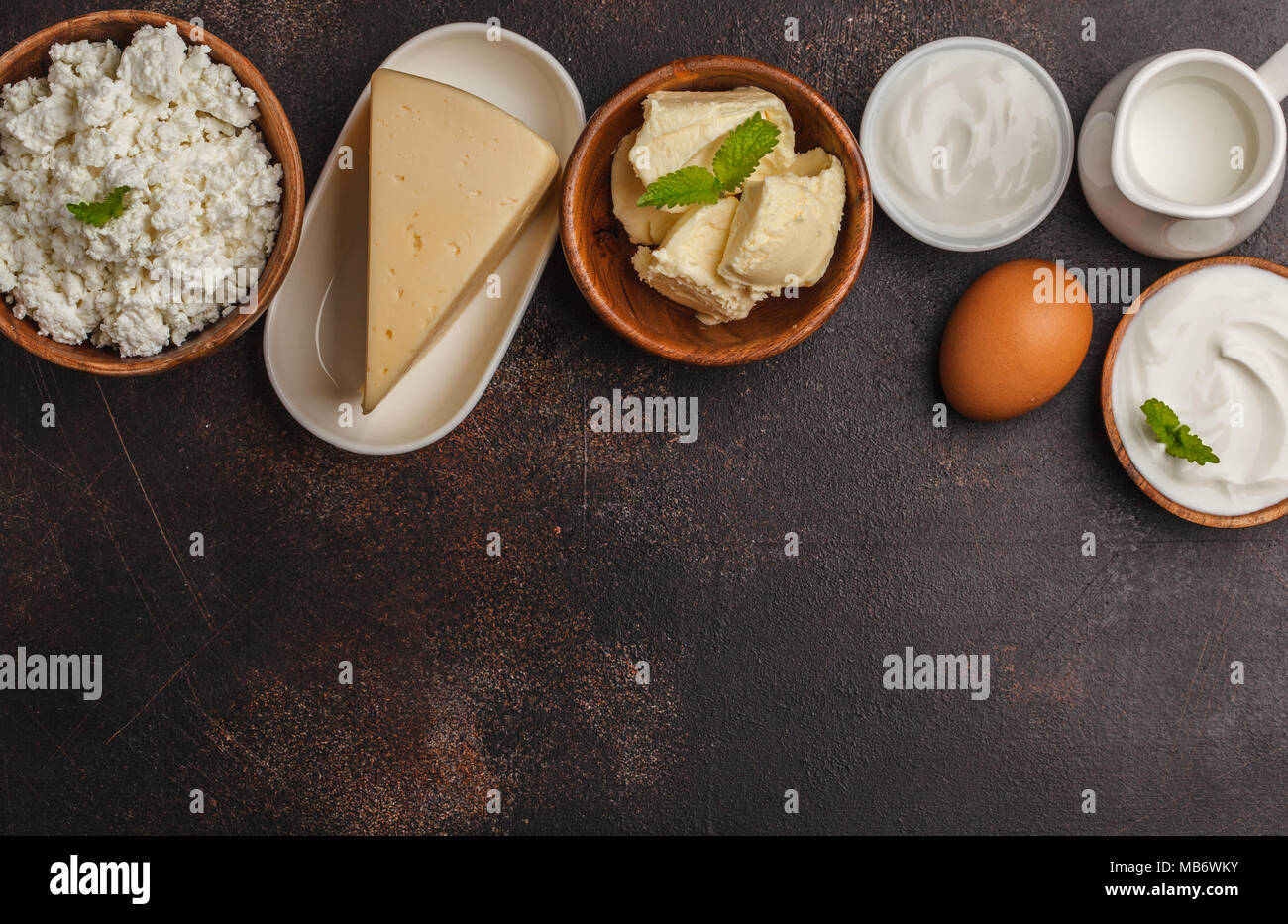 Different types of dairy products on dark background Stock Photo - Alamy