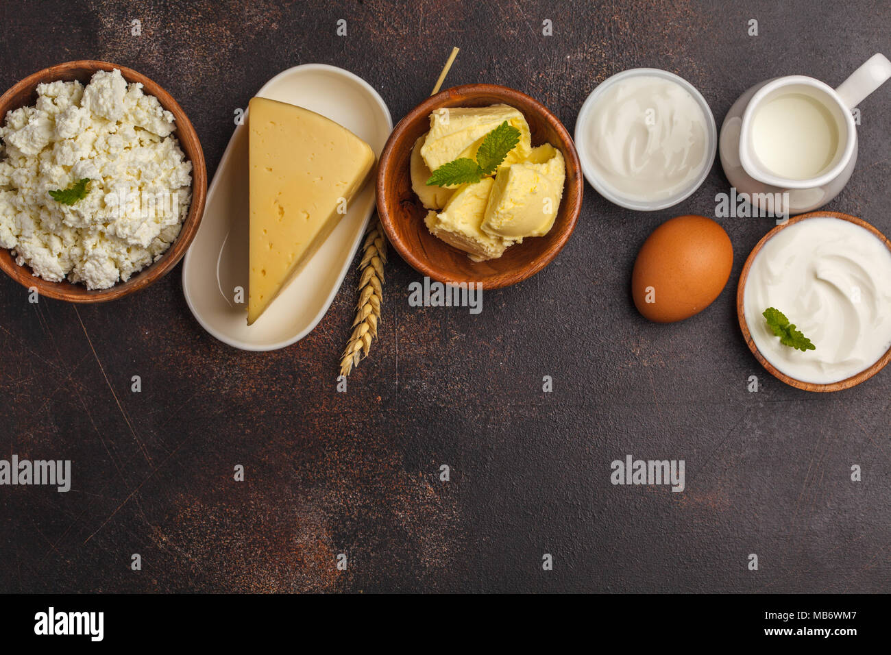 Different types of dairy products on dark background Stock Photo - Alamy