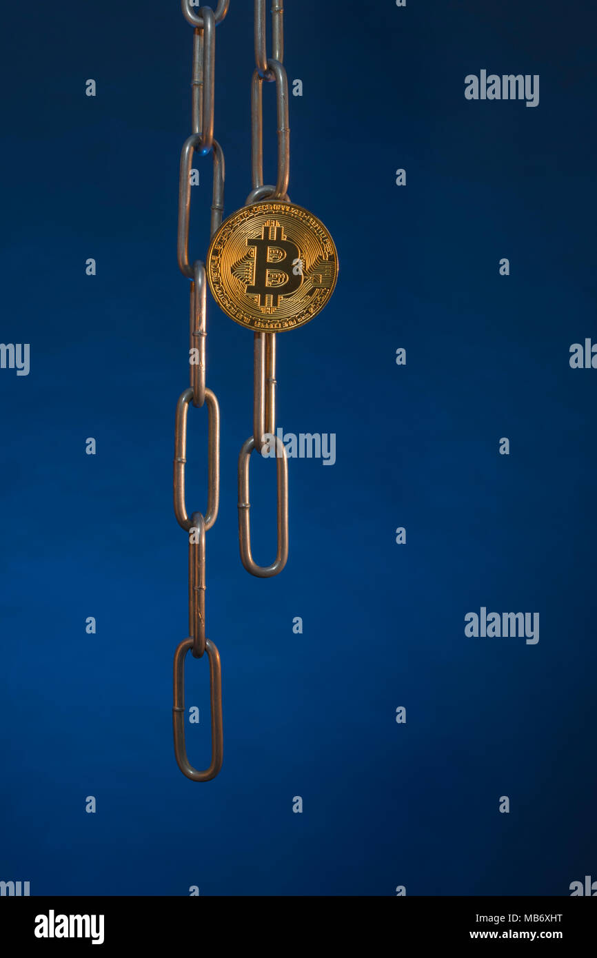 Metal chains with gold Bitcoin - as metaphor for cryptocurrency ...