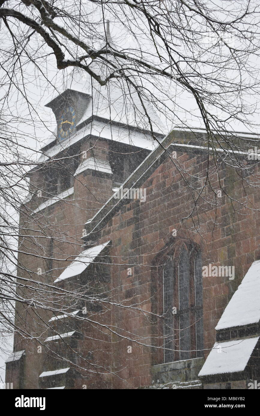Chester's St John the Baptist's Church battling with the snow Stock ...