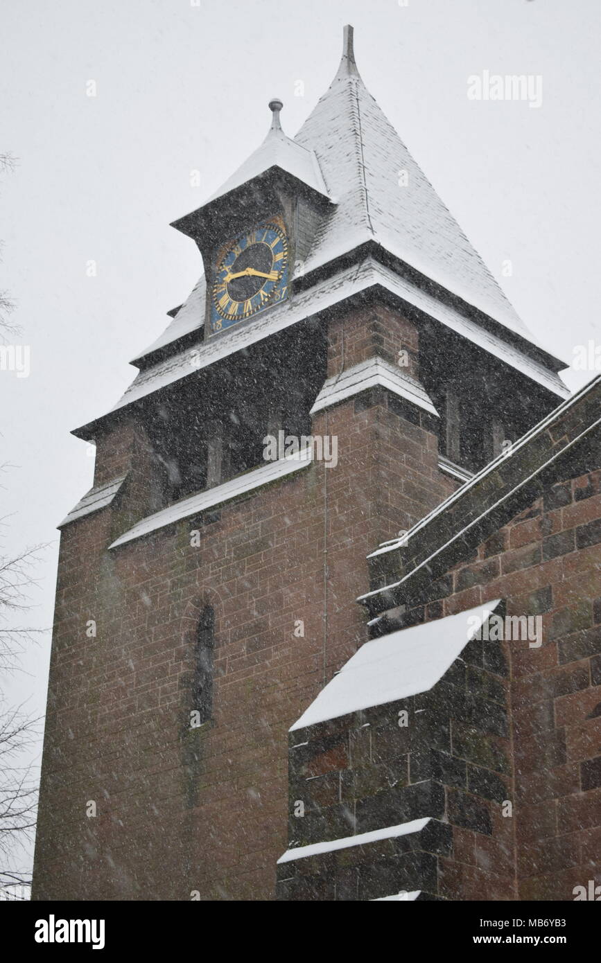 Chester's St John the Baptist's Church battling with the snow Stock ...