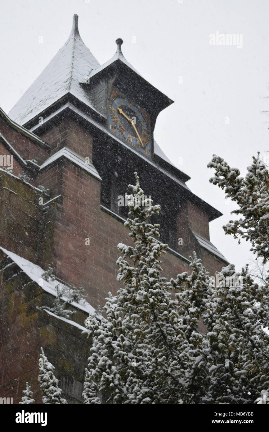 Chester's St John the Baptist's Church battling with the snow Stock ...