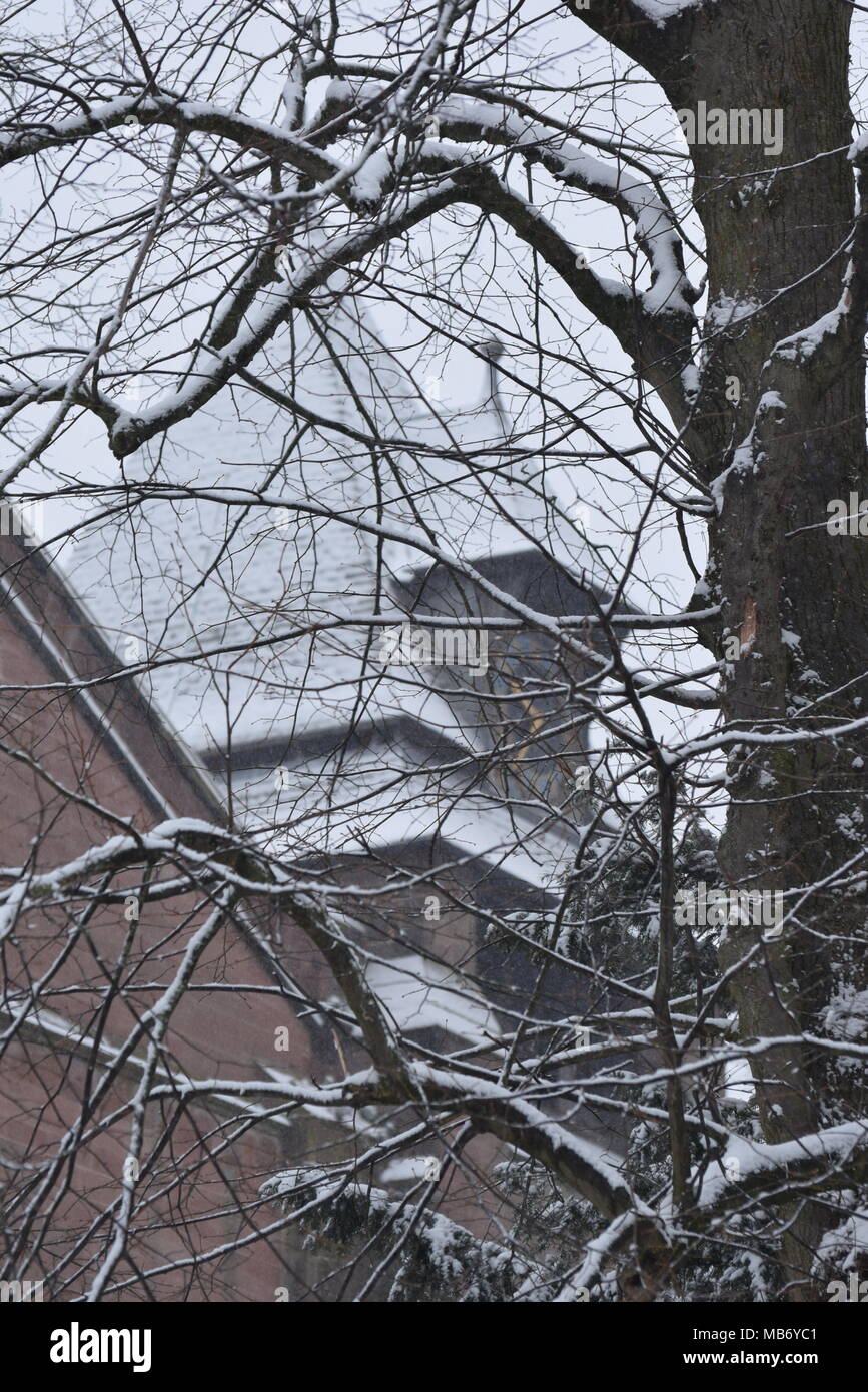 Chester's St John the Baptist's Church battling with the snow Stock ...