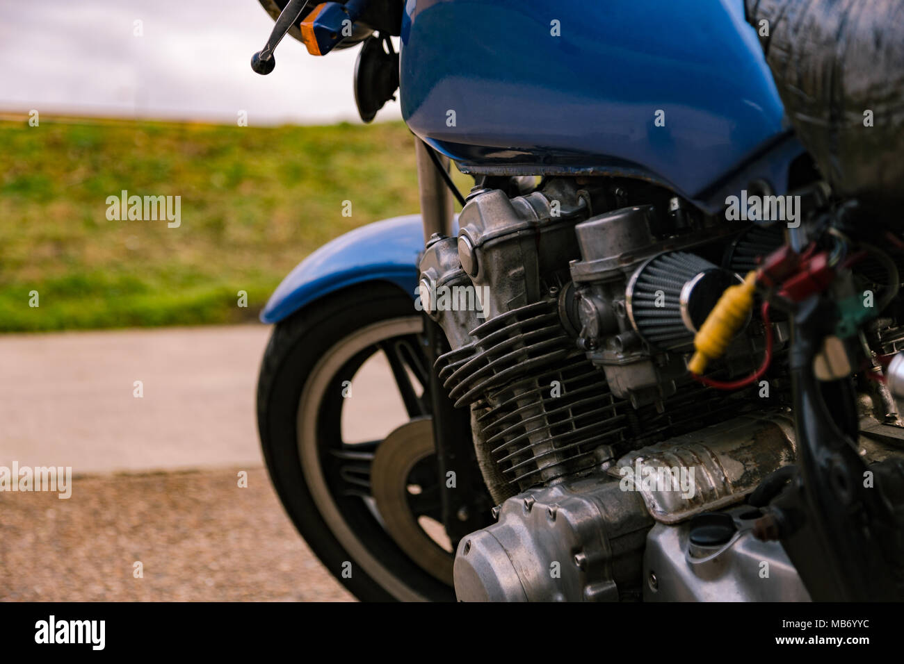Close up picture of blue vintage motorcycle Stock Photo - Alamy