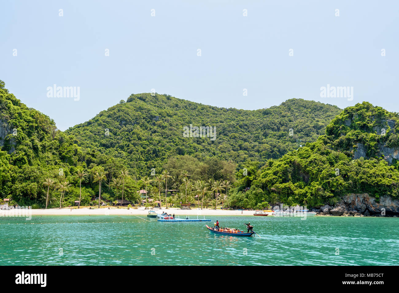 SURAT THANI, THAILAND-APRIL 26, Tourists are traveling by long tail ...