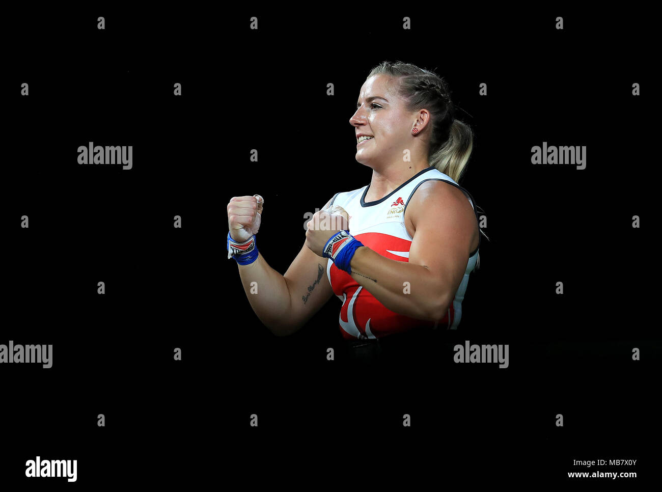 England's Emily Godley celebrates during the Women's 75kg weightlifting ...
