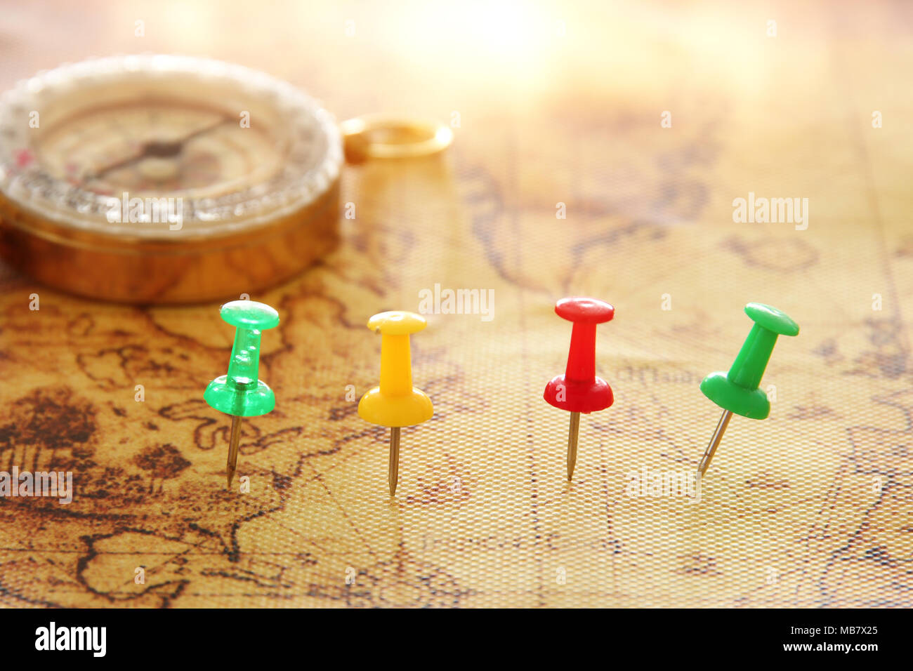 Image of pins attached to map, showing location or travel destination ...