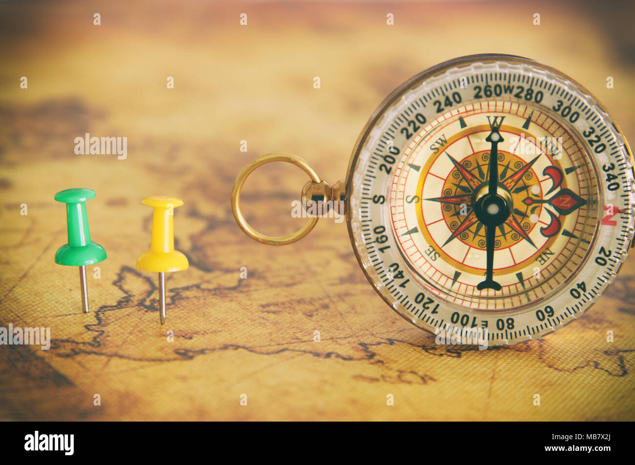 Image of pins attached to map, showing location or travel destination ...