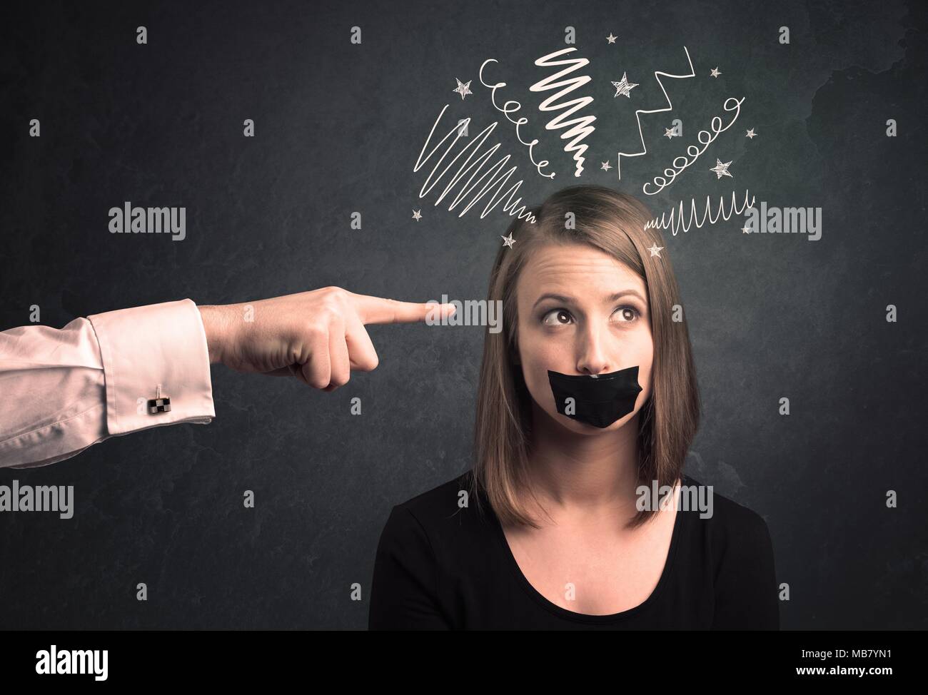 Caucasian hand pointing at scared female employee Stock Photo - Alamy