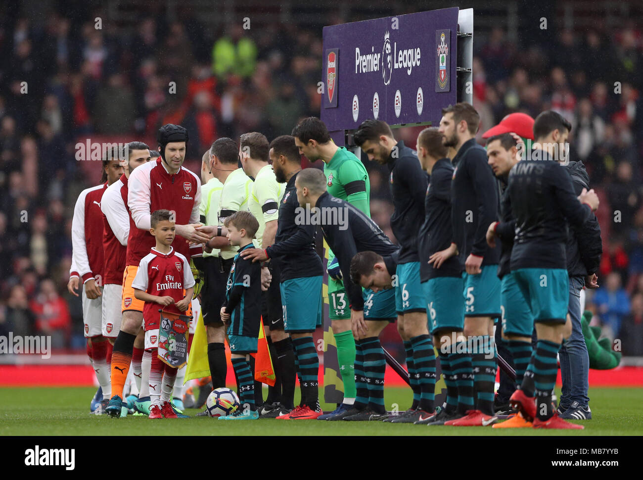 Arsenal and Southampton players shake hands before the Premier League ...