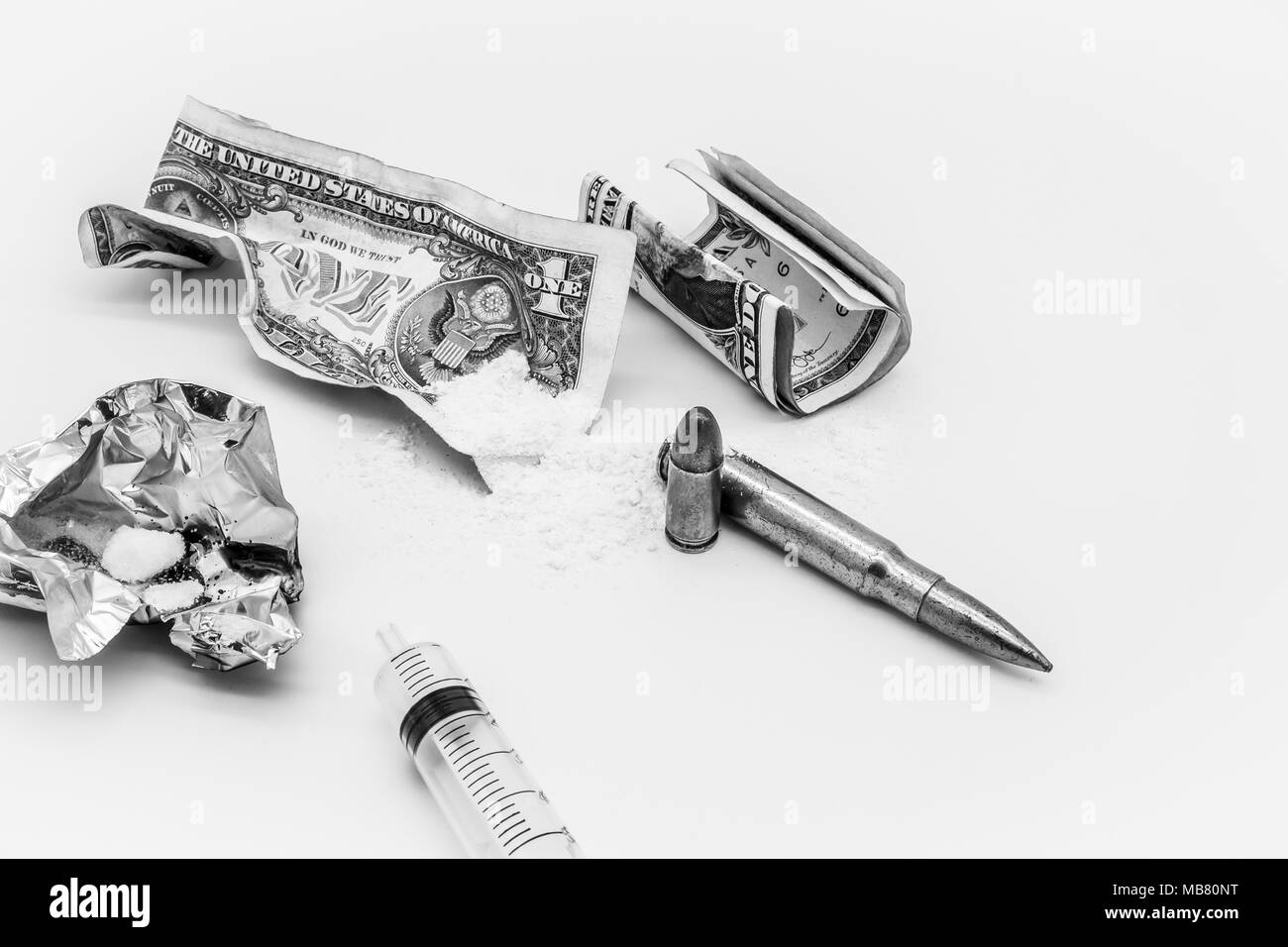 Mock-up concept of illegal drug dealing on a work surface. The view ...