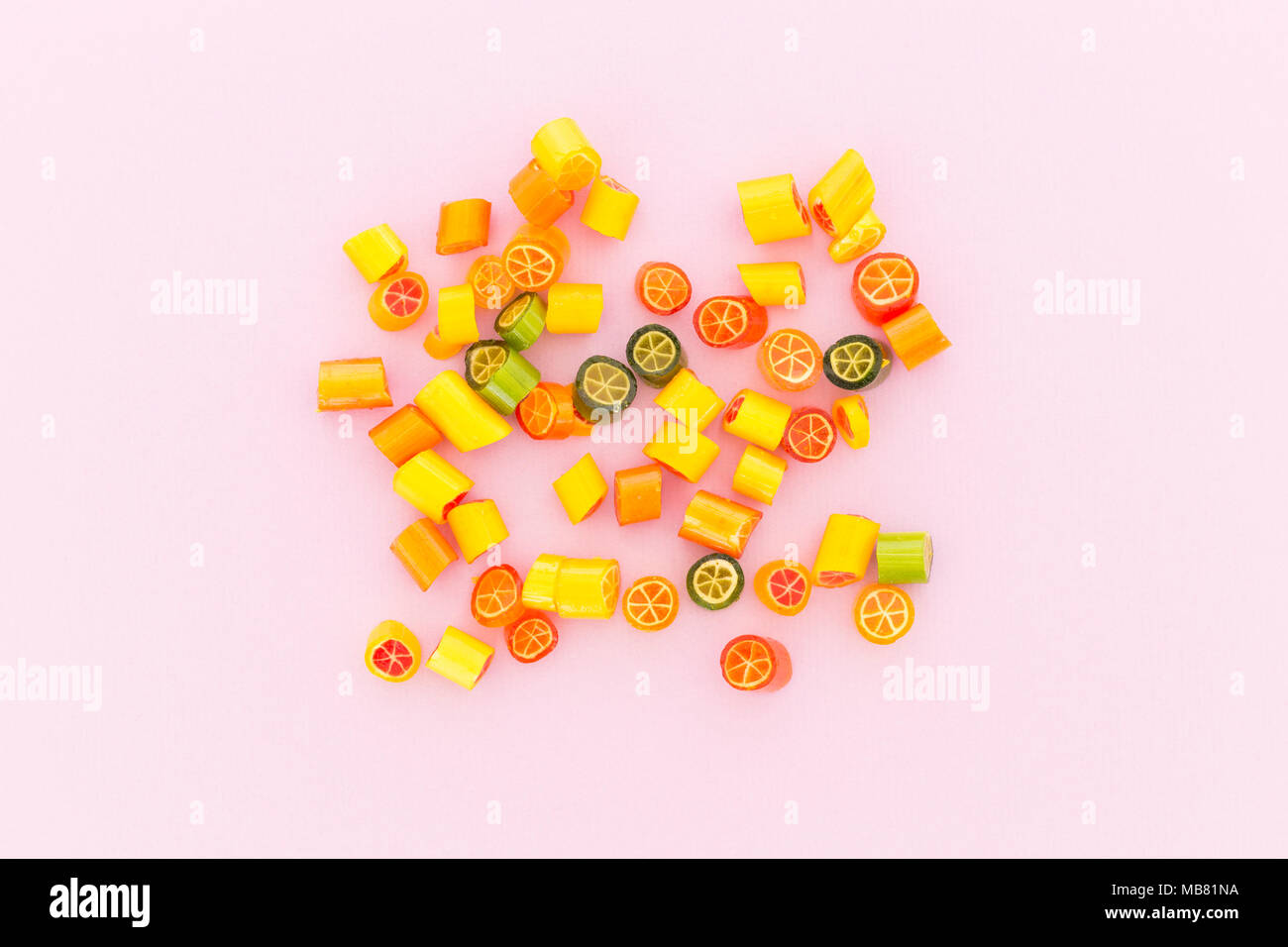 Assortment of colorful sweet handmade candy pieces arranged on light ...