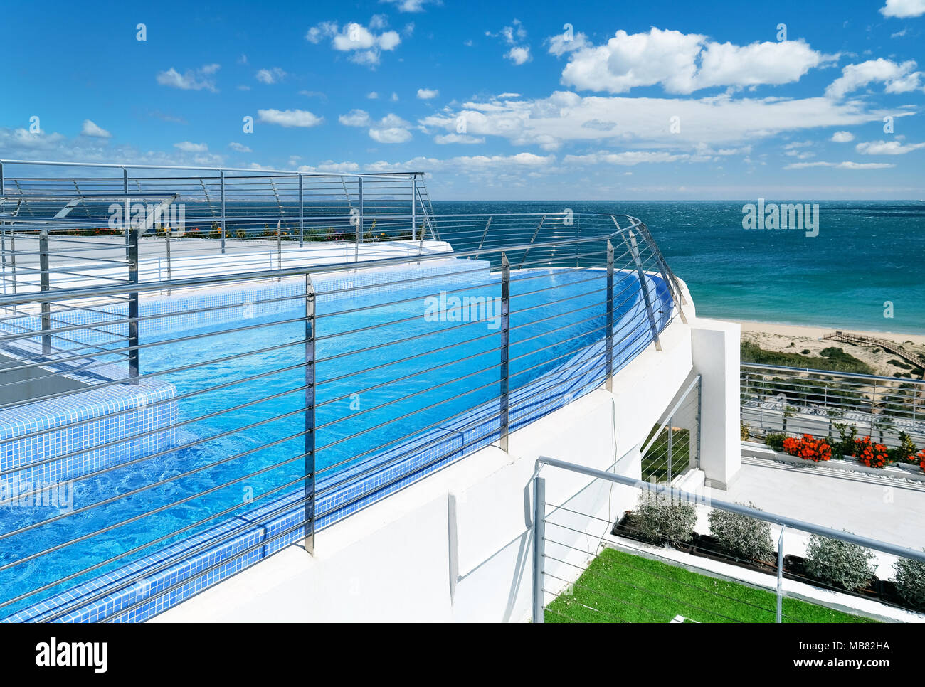 Swimming pool and view to the Mediterranean Sea. Spain Stock Photo - Alamy