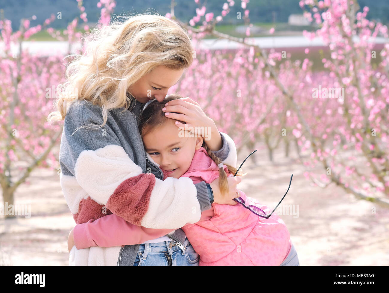 Woman peach tree grove hi-res stock photography and images - Alamy
