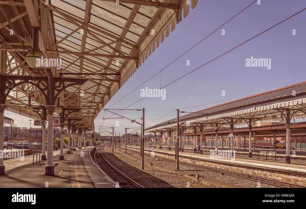 Empty railway platform, with its elegant 19th Century architecture ...