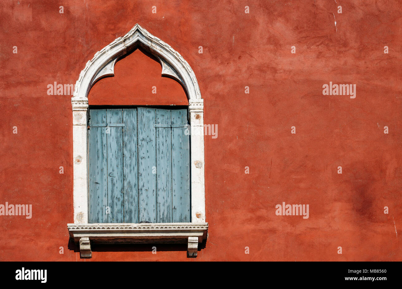 Venetian style window and background Stock Photo - Alamy