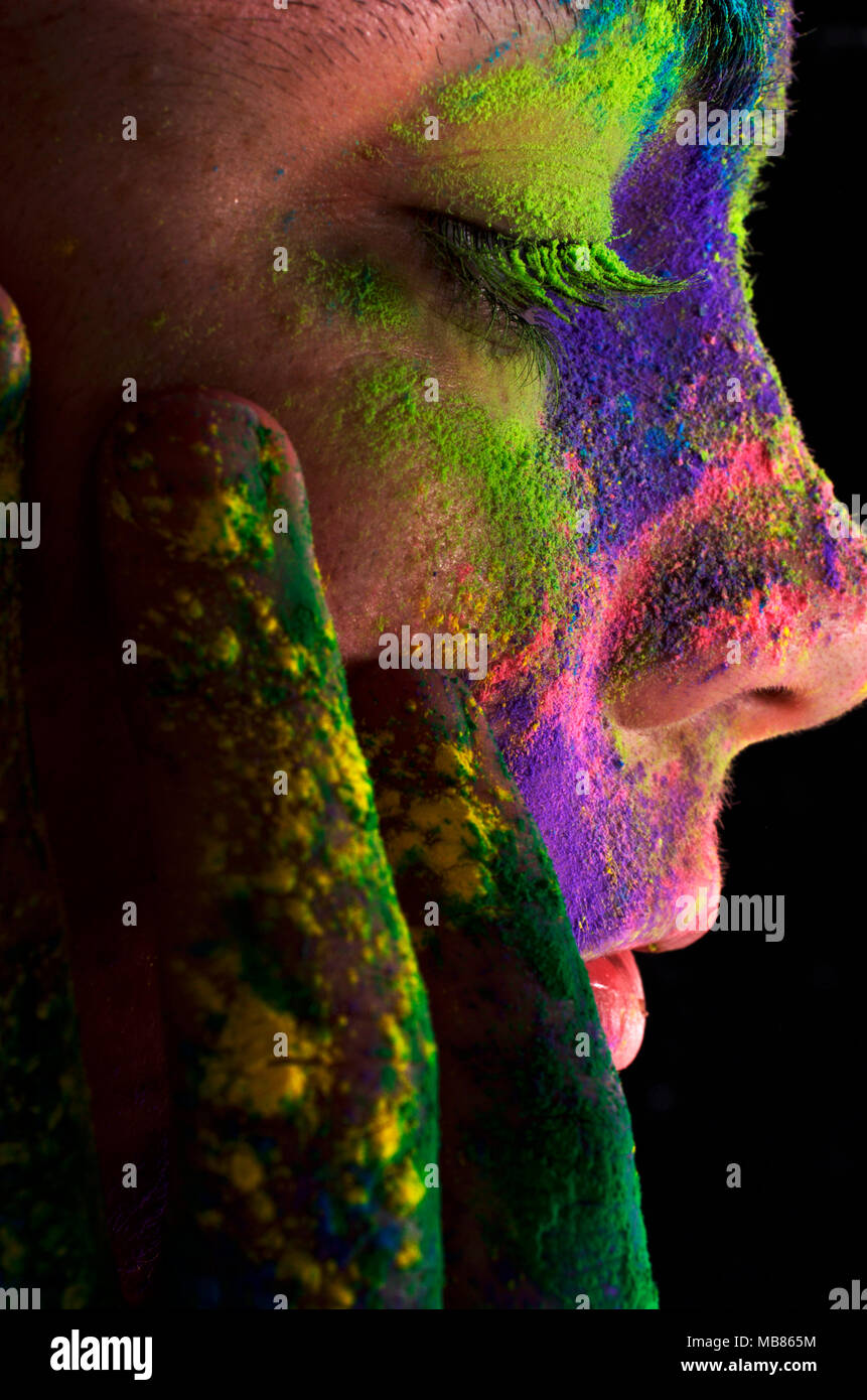 Holi Powder On Posing Model Stock Photo - Alamy