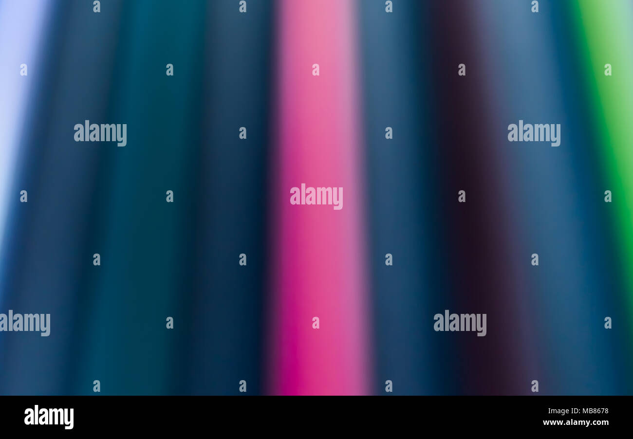 vertical blurred colored lines divided by color red Stock Photo - Alamy