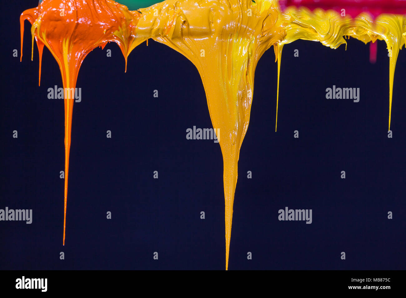 colorful of plastisol ink stick on printer handle start flowing down ...