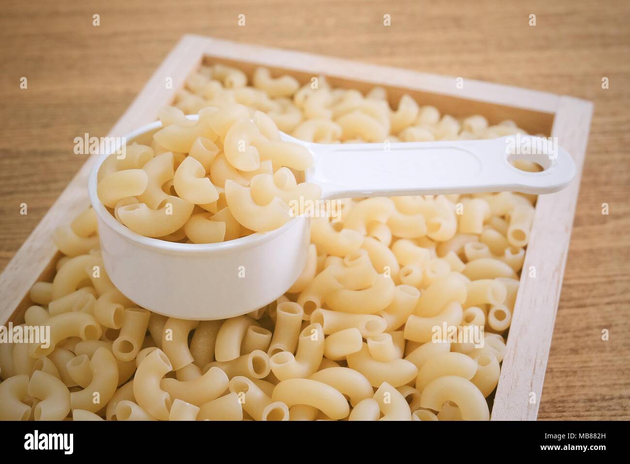 Food and Cuisine, Uncooked and Dried Elbow Macaroni or Gomiti Pasta in ...