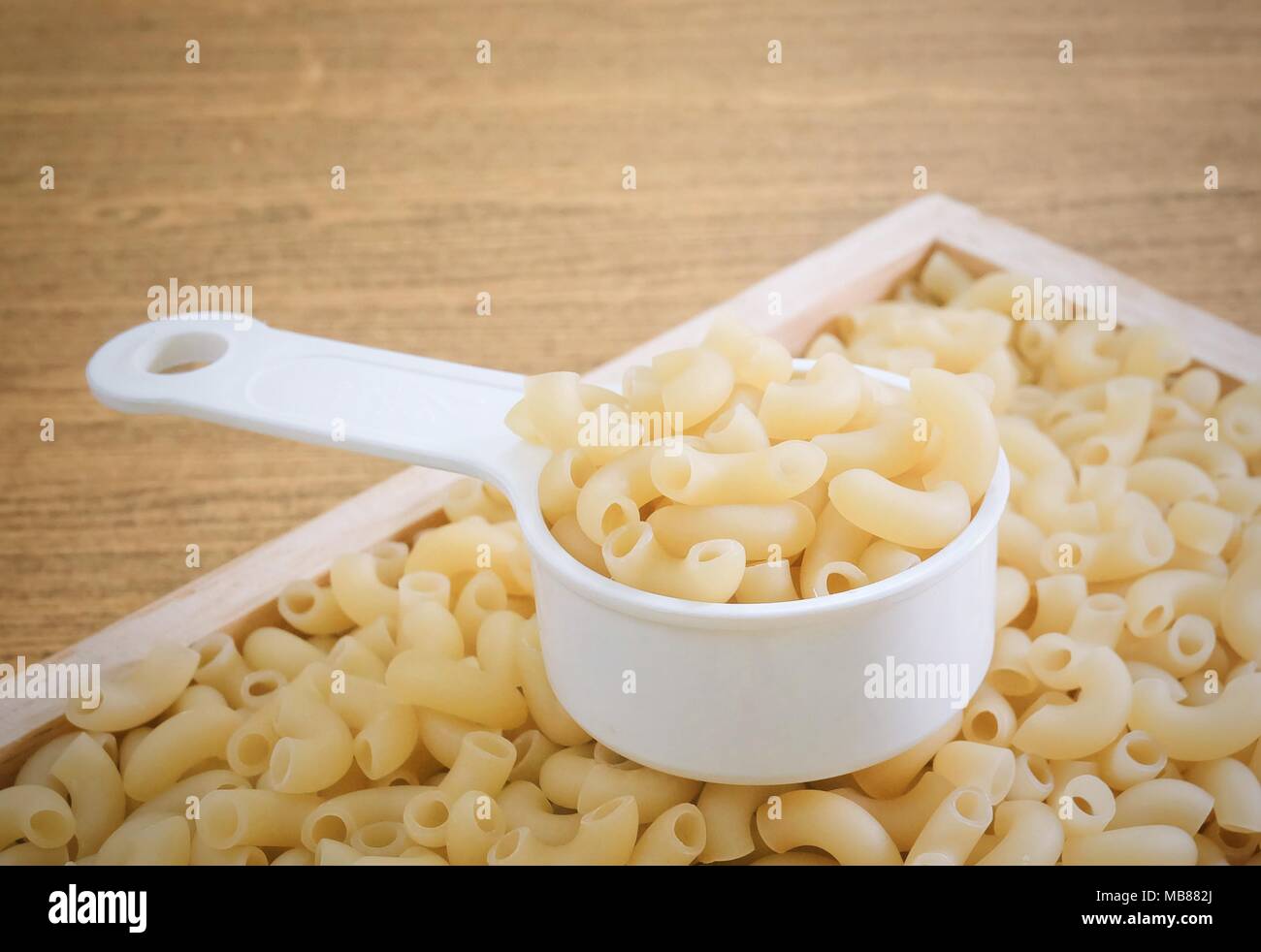Food and Cuisine, Uncooked and Dried Elbow Macaroni or Gomiti Pasta in ...