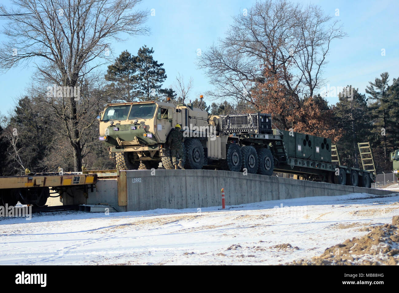 Marines with Marine Wing Support Squadron (MWSS) 271 load equipment on ...