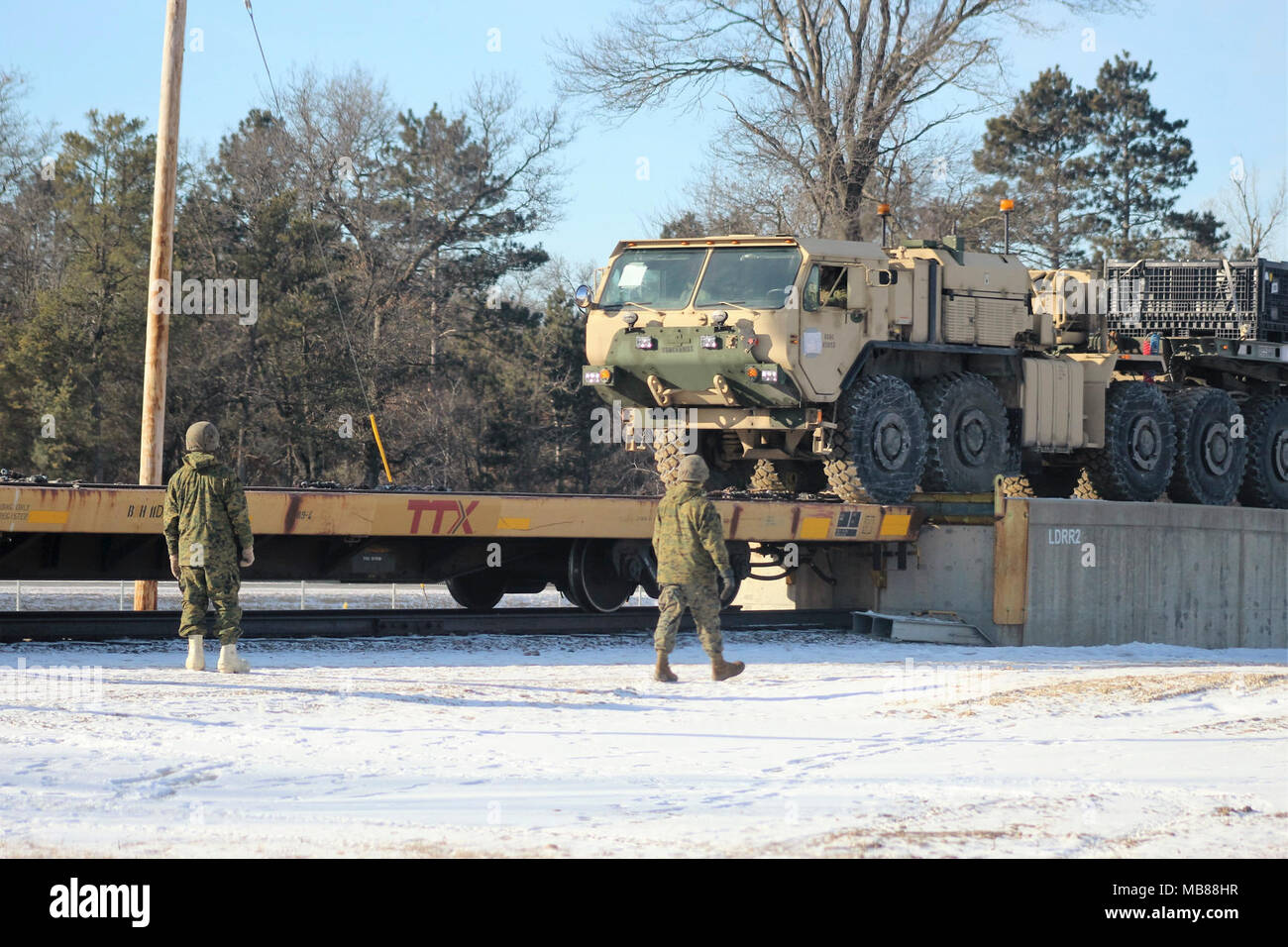 Marines with Marine Wing Support Squadron (MWSS) 271 load equipment on ...