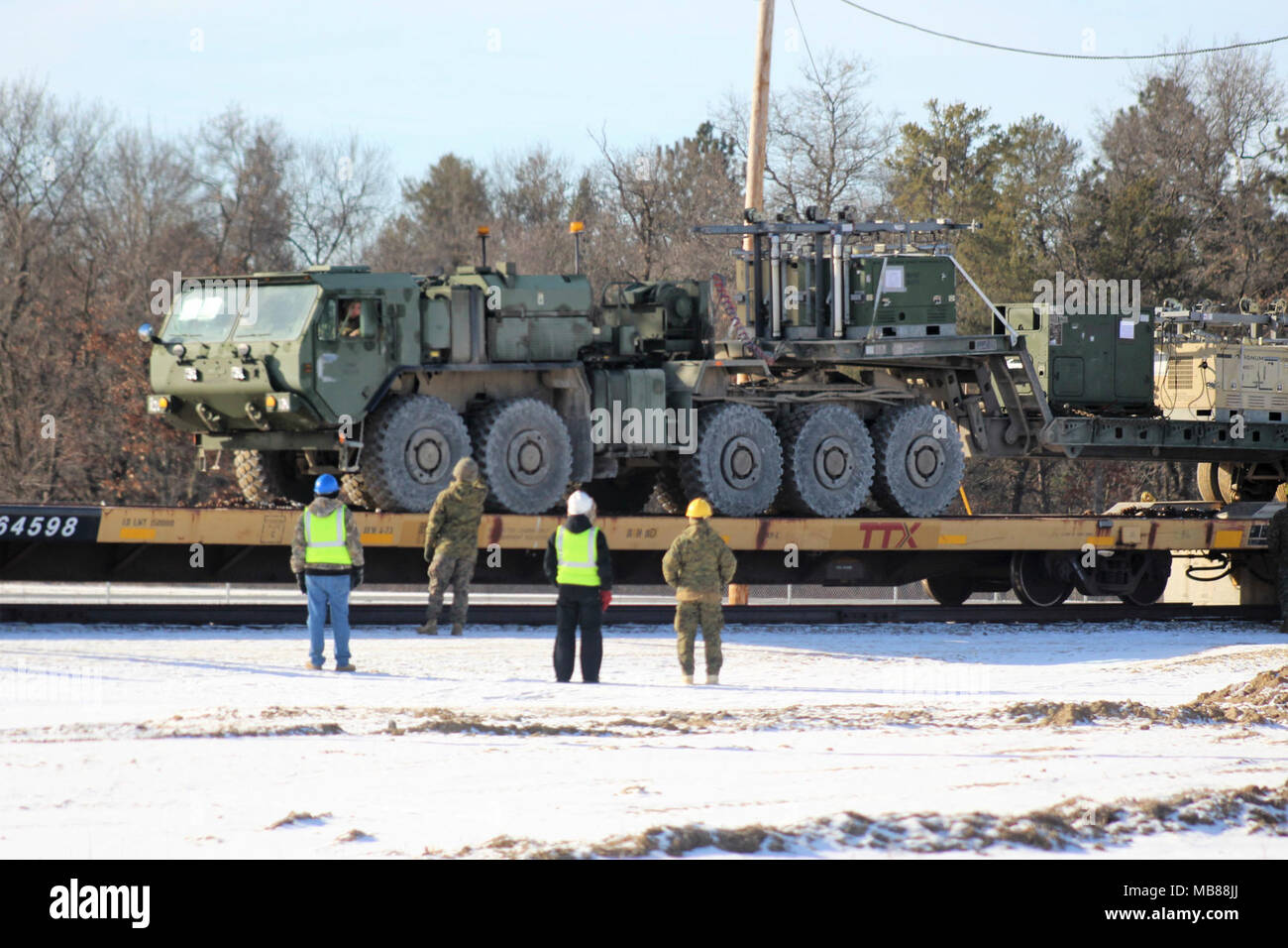 Marines with Marine Wing Support Squadron (MWSS) 271 load equipment on ...