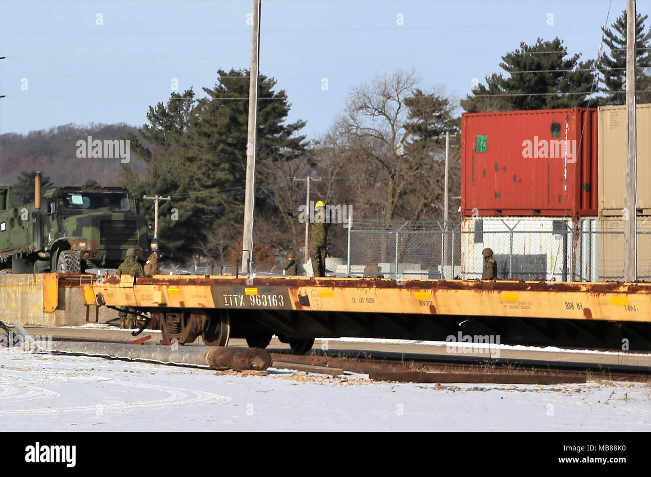 Marines with Marine Wing Support Squadron (MWSS) 271 load equipment on ...