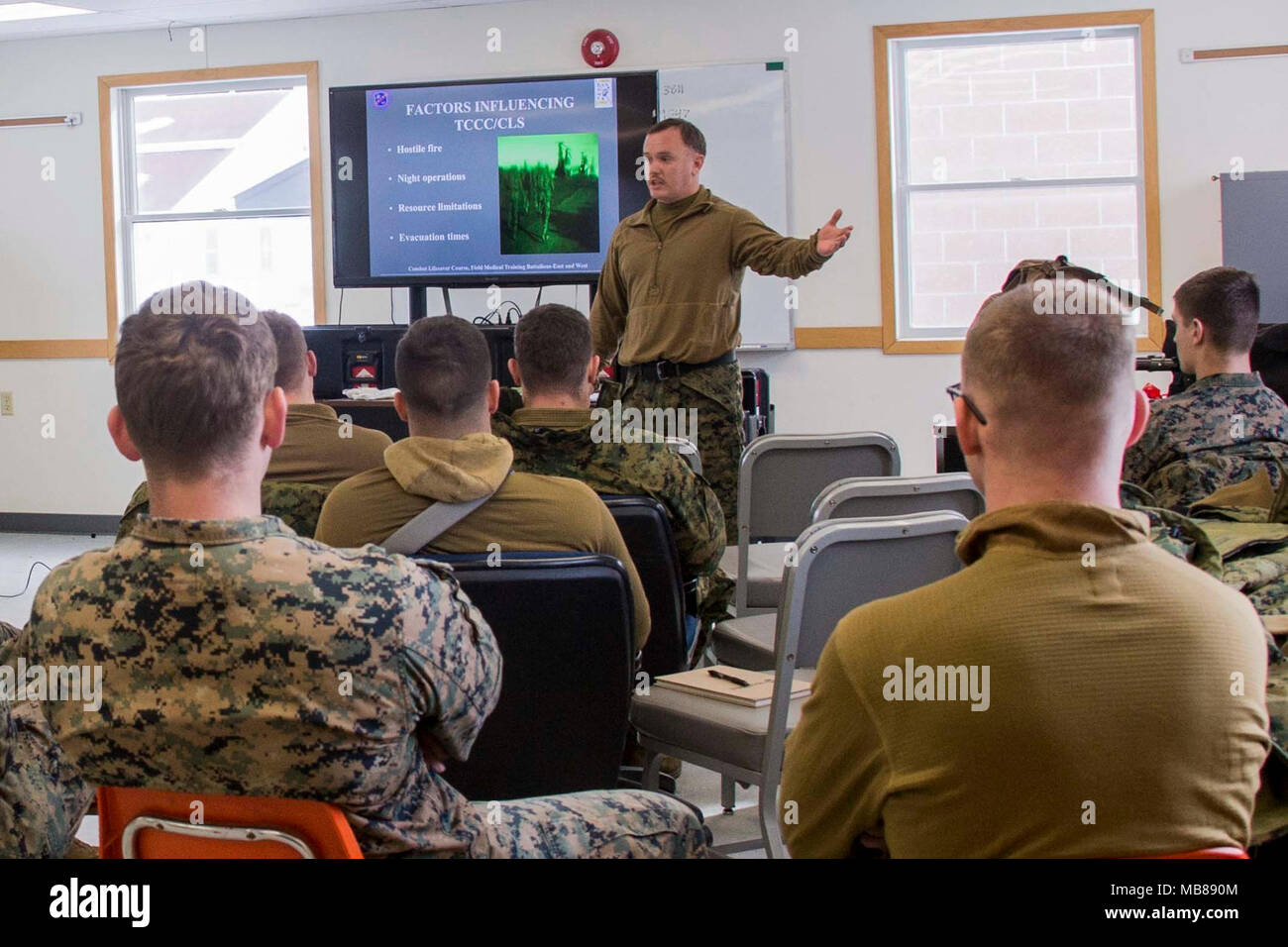 U.S. Navy Hospital Corpsman 1st Class Kyle E. Keeler with Marine ...