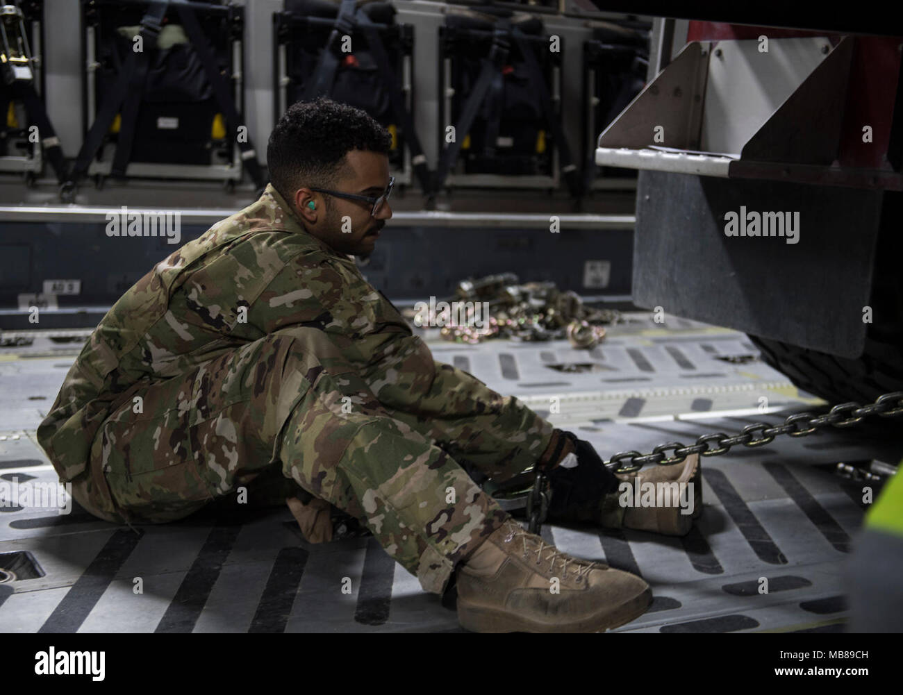 A U.S. Air Force C-17 Globemaster III loadmaster, assigned to the 816th ...