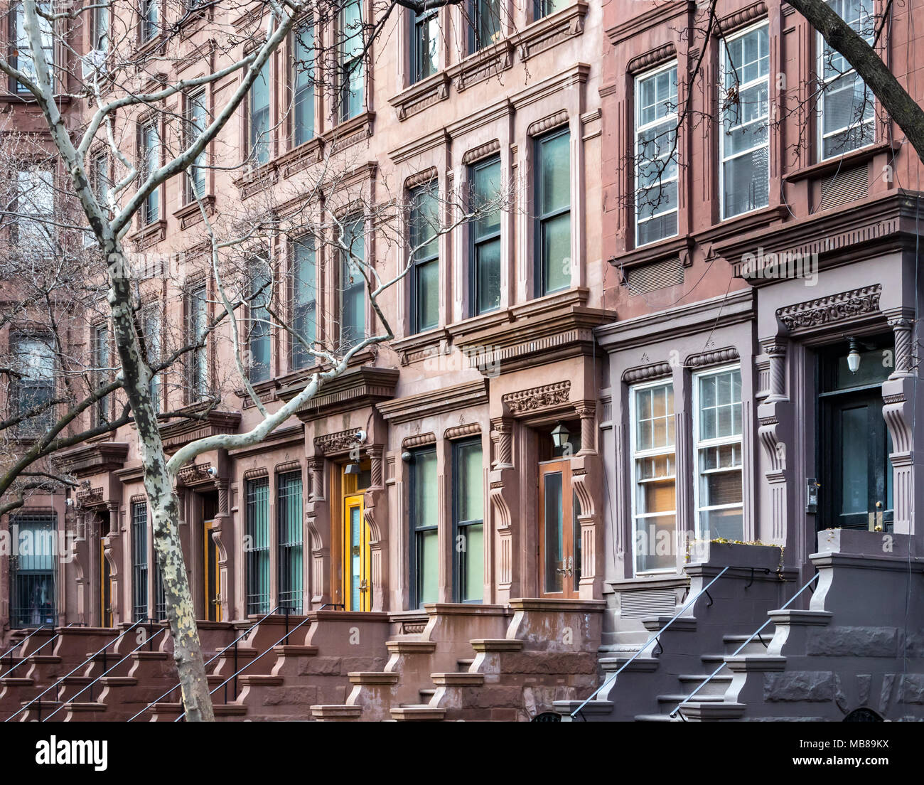 Block of Brownstone buildings in the Upper West Side neighborhood of ...