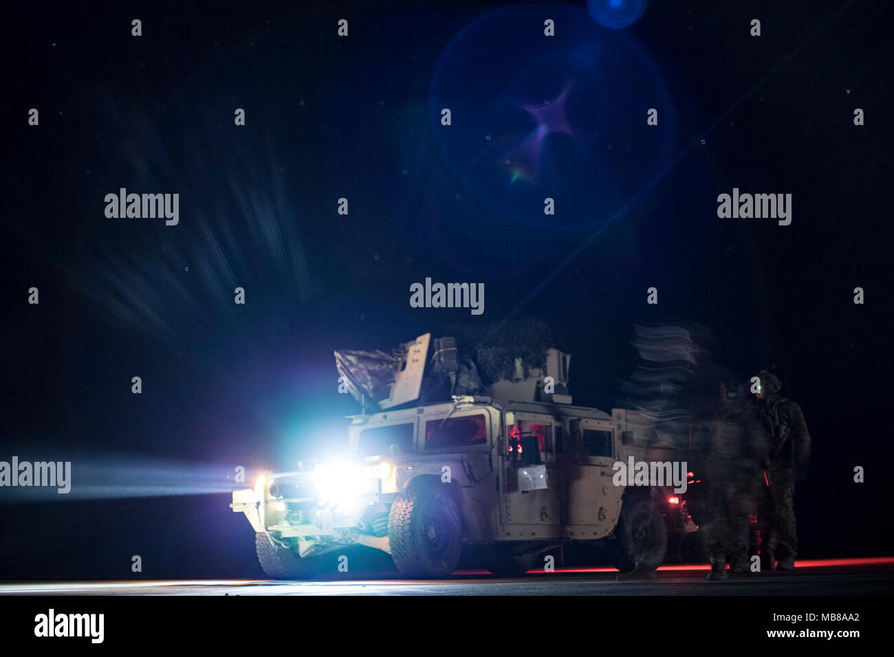 A member of the U.S. Army takes delivery of a Humvee after it was off ...