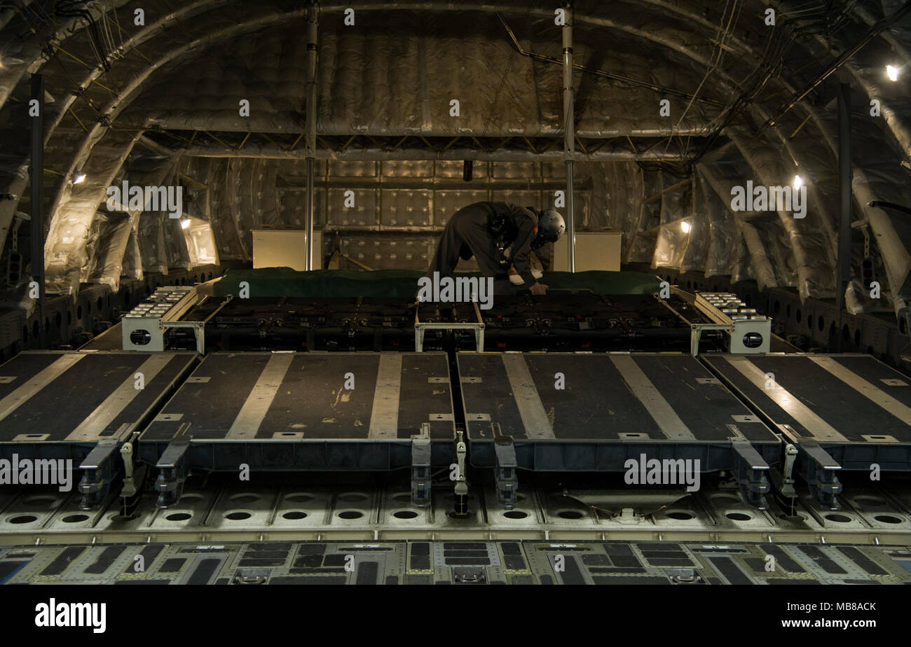 Airman 1st Class Steven Slover, 535th Airlift Squadron loadmaster, goes ...