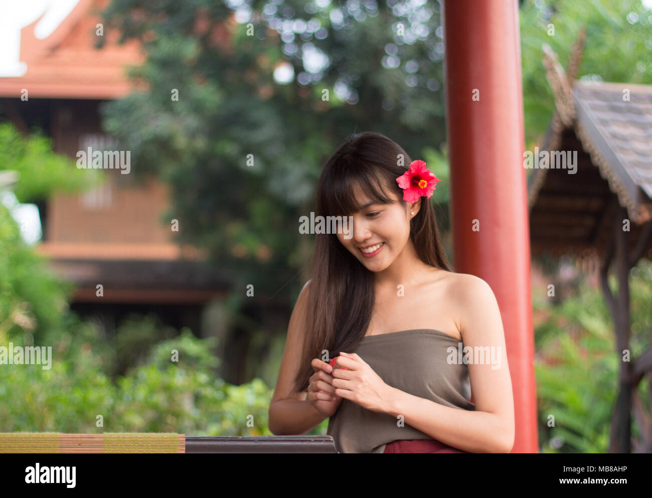 Nice and beautiful smiling Thai girl with Thai ancient style dressing ...