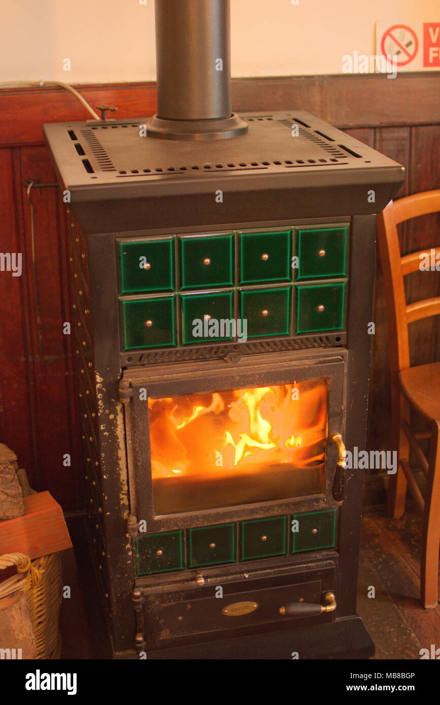 Salbertrand, Italy: Indoor log fire in a restaurant Stock Photo - Alamy