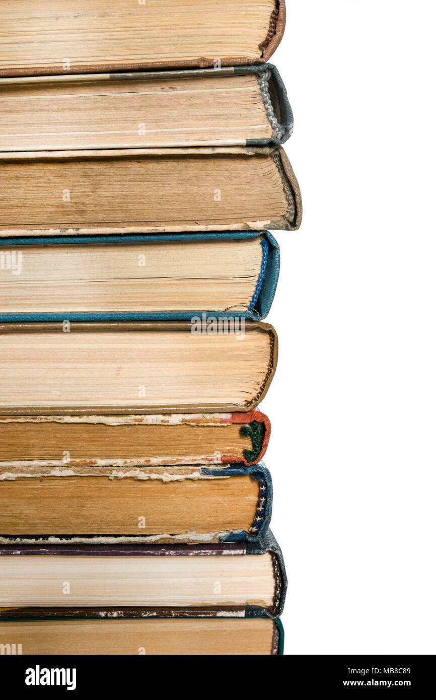 Stack of old books on the side on white isolated background. Love read ...