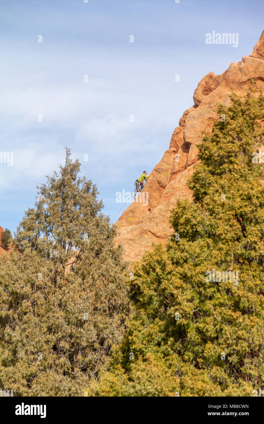 Rock climber climbing at the Garden of the Gods, Colorado Springs ...
