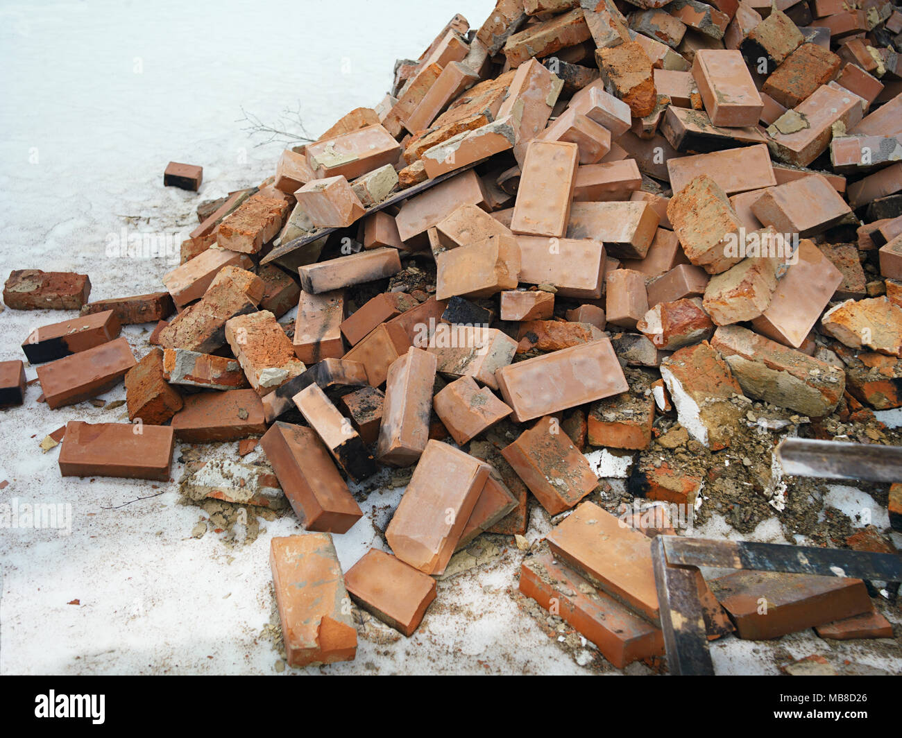 Pile of broken bricks laid on the snow Stock Photo - Alamy
