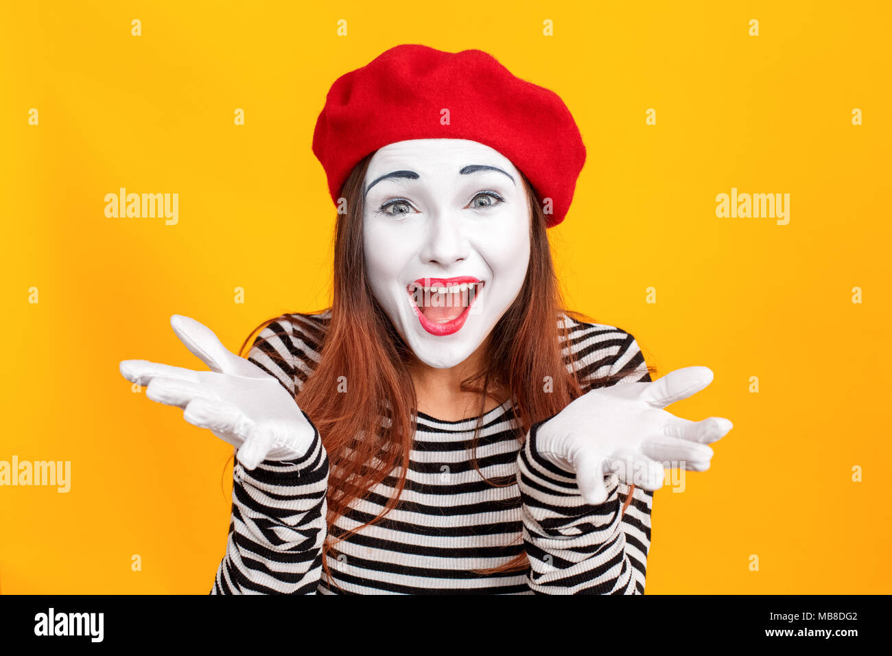 Closeup portrait of success mime woman in striped jacket, happines and ...
