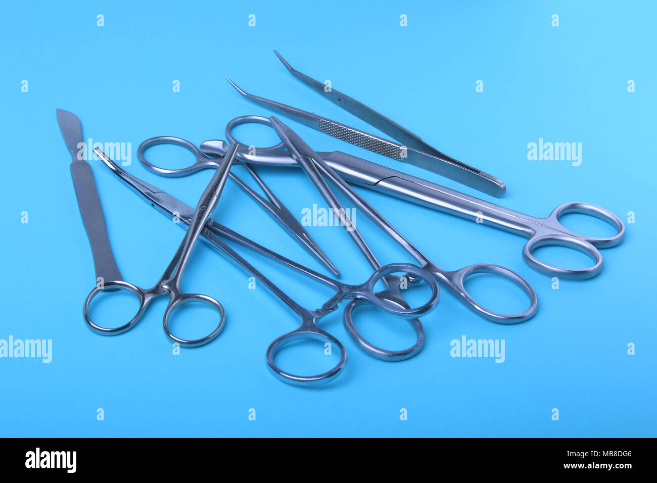 surgical instruments and tools including scalpels, forceps and tweezers ...
