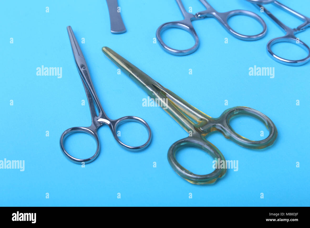 surgical instruments and tools including scalpels, forceps and tweezers ...