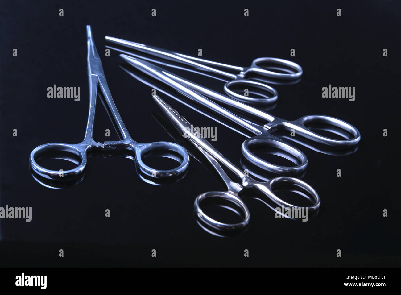 surgical instruments and tools including scalpels, forceps and tweezers ...